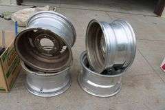 Set of 4 Alum. Chevrolet rims - Lee Real Estate & Auction Service