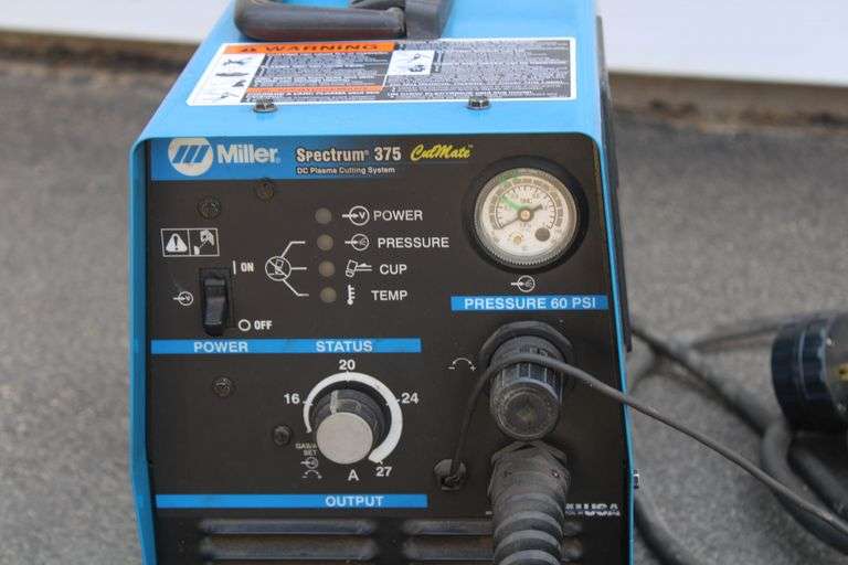 Miller portable plasma cutter - Lee Real Estate & Auction Service
