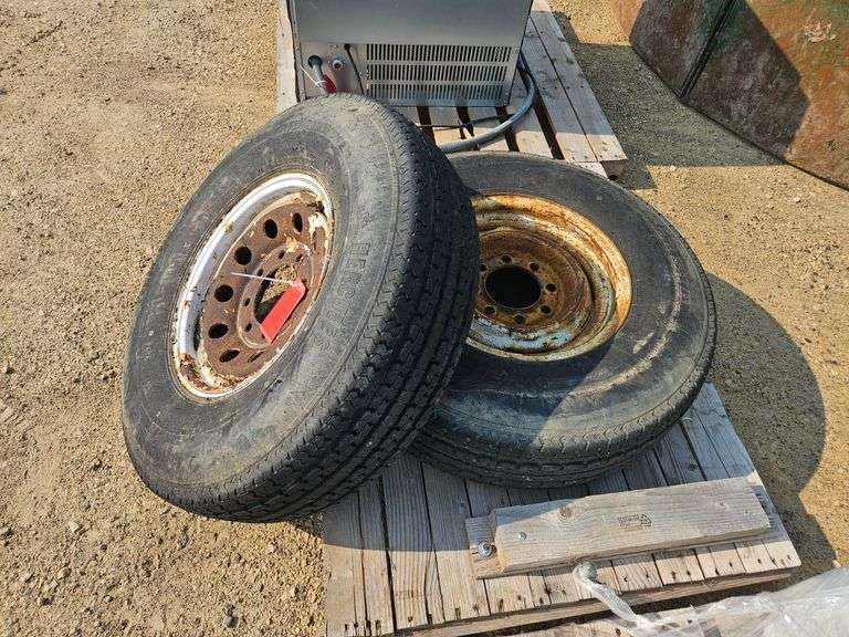 (2) ST235/85R16 Tires on 8-hole Rims - Lee Real Estate & Auction Service