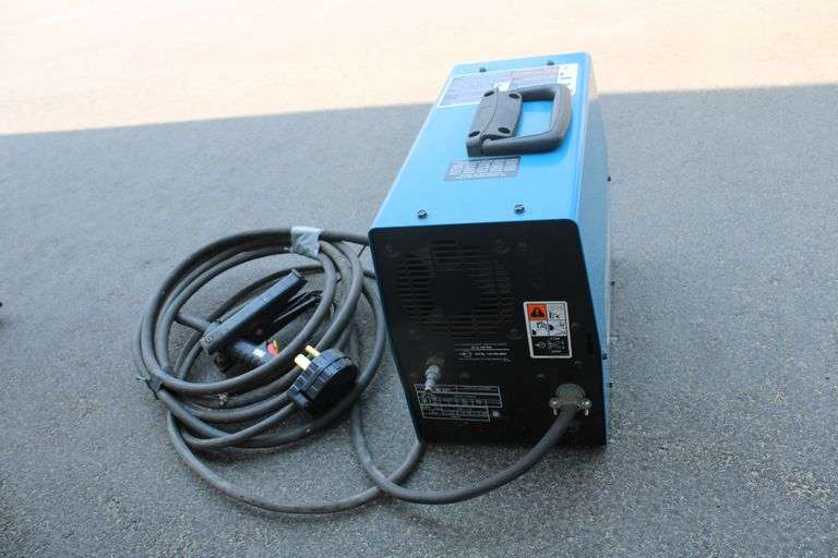 Miller portable plasma cutter - Lee Real Estate & Auction Service