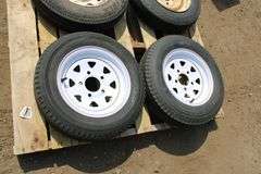 Pair of trailer tires on rims - Lee Real Estate & Auction Service