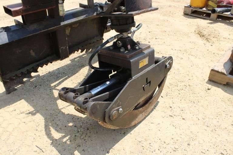 Branch Manager skiloader mount log clam - Lee Real Estate & Auction Service