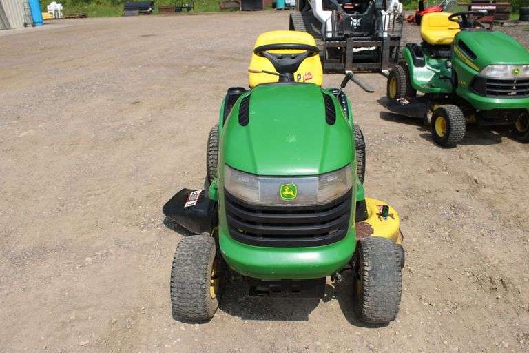 John Deere L111 riding lawn mower - Lee Real Estate & Auction Service