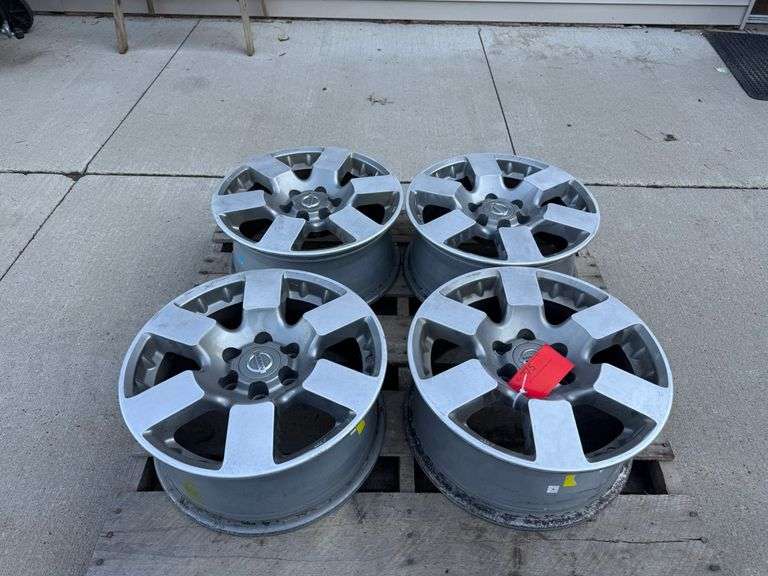 (4) 17" Aluminum Rims off Nissan Frontier - Lee Real Estate & Auction ...