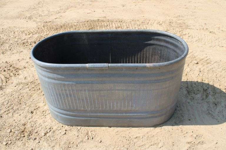 Farm & Fleet galvanized stock tank - Lee Real Estate & Auction Service