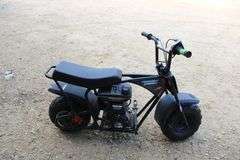 Monster Moto 80cc dirt bike - Lee Real Estate & Auction Service