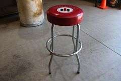 IH Farmall bar stool - Lee Real Estate & Auction Service