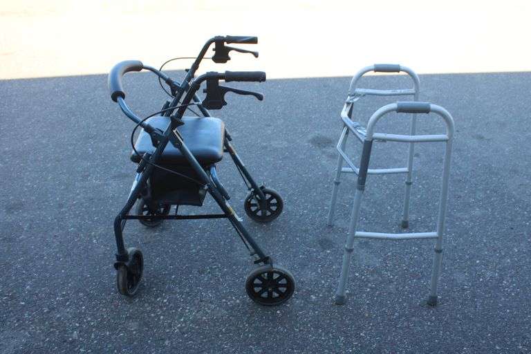 Walker w/seat & brakes w/folding walker - Lee Real Estate & Auction Service