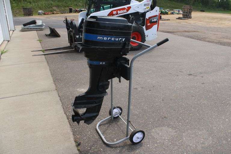 Mercury 20 hp. outboard boat motor w/rolling stand - Lee Real Estate ...