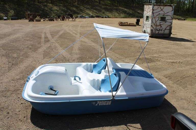 Pelican 4 person paddle boat w/Bimini cover - Lee Real Estate & Auction ...