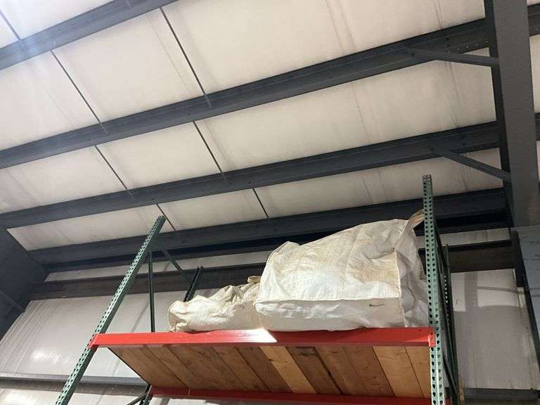 Tote bags on top shelf of pallet racking - Hamilton-Maring Auction Group