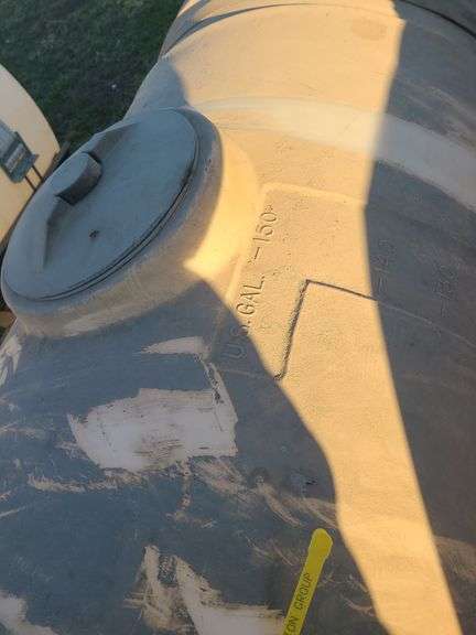 150 gallon poly tank on saddle frame - Hamilton-Maring Auction Group