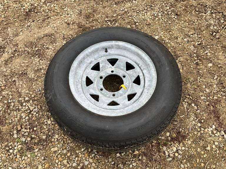15" Tire on 6 Bolt Rim - Hamilton-Maring Auction Group