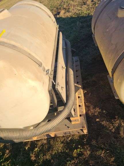 200 gallon poly tank on saddle frame - Hamilton-Maring Auction Group