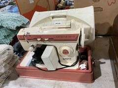 Singer Merritt 2404 Sewing Machine with Carrying C - Hamilton-Maring ...