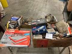 shelf of automotive parts - Hamilton-Maring Auction Group