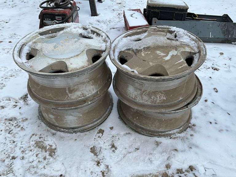 (4) chevy 6 bolt rims - Hamilton-Maring Auction Group