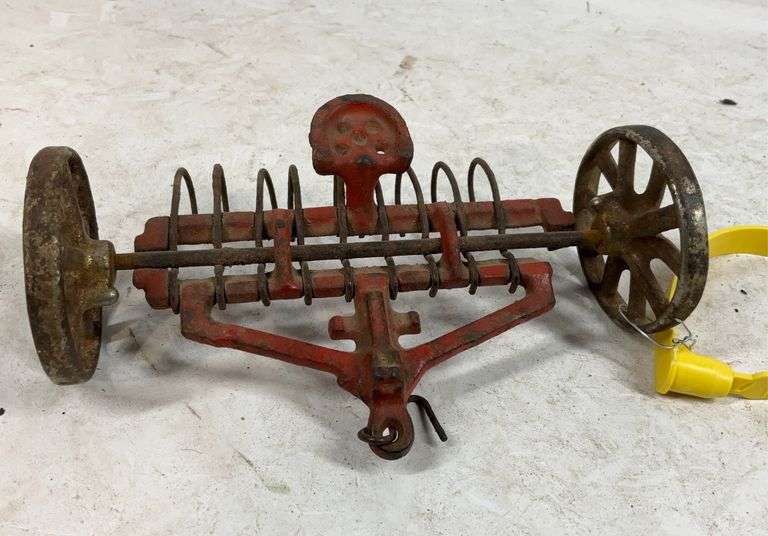 Arcade cast iron dump rake - Hamilton-Maring Auction Group
