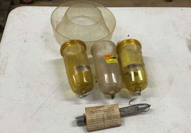 Assorted fuel barrel sediment jars, air cleaner piece - Hamilton-Maring ...
