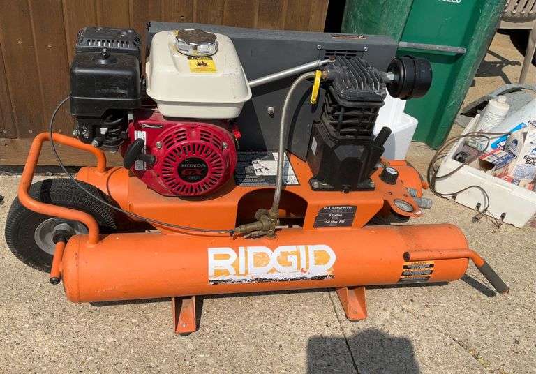 Gas powered portable Rigid air compressor - Hamilton-Maring Auction Group