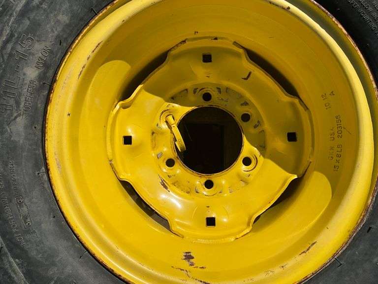 (1) 11L15 Tire on 6-Bolt Rim - Hamilton-Maring Auction Group