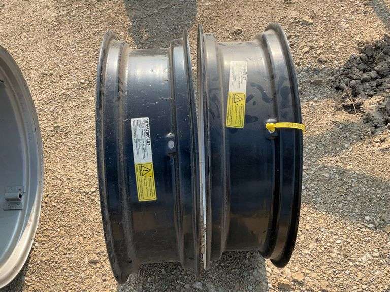 (2) New 24"x7" Rims for International Cub - Hamilton-Maring Auction Group
