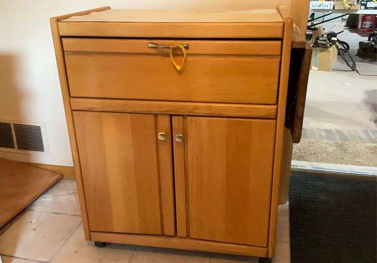 Rolling kitchen cabinet with cutting board - Hamilton-Maring Auction Group