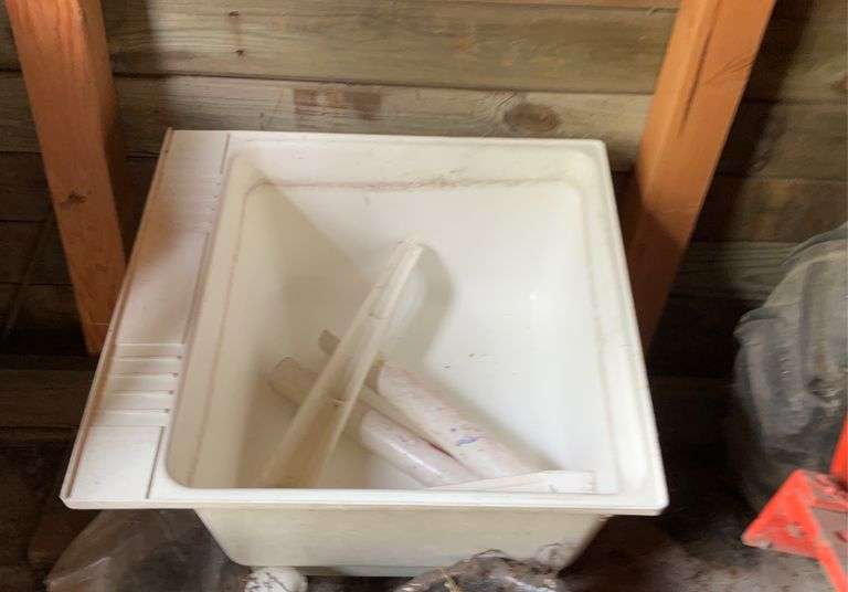 Swan and Rabbit Planters, Sink, Planters (located in west end of far ...