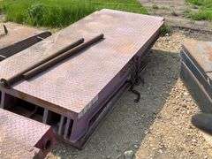 Heavy Duty Bi-Fold Ramps off RGN Trailer - Hamilton-Maring Auction Group