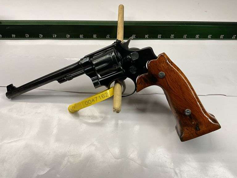 Smith & Wesson Revolver 22 long rifle CTG with lea - Hamilton-Maring Auction Group