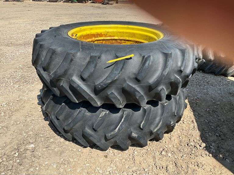 (2) 16.9 x 34 tractor tires; titan, on yellow rims - Hamilton-Maring ...
