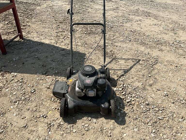 Yard machine push mower, needs a gas cap - Hamilton-Maring Auction Group
