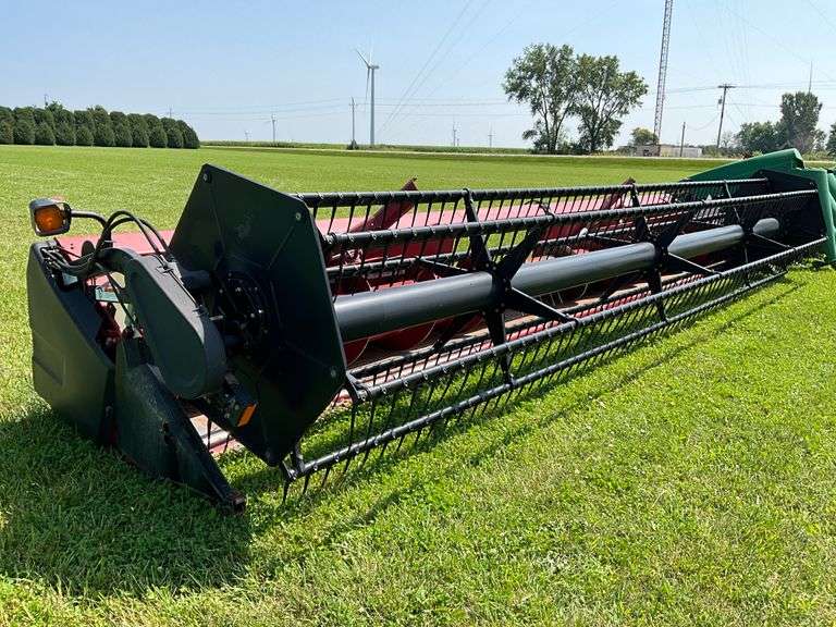 Case IH 1020 25ft bean head; fore/aft; 3" cut - Hamilton-Maring Auction ...