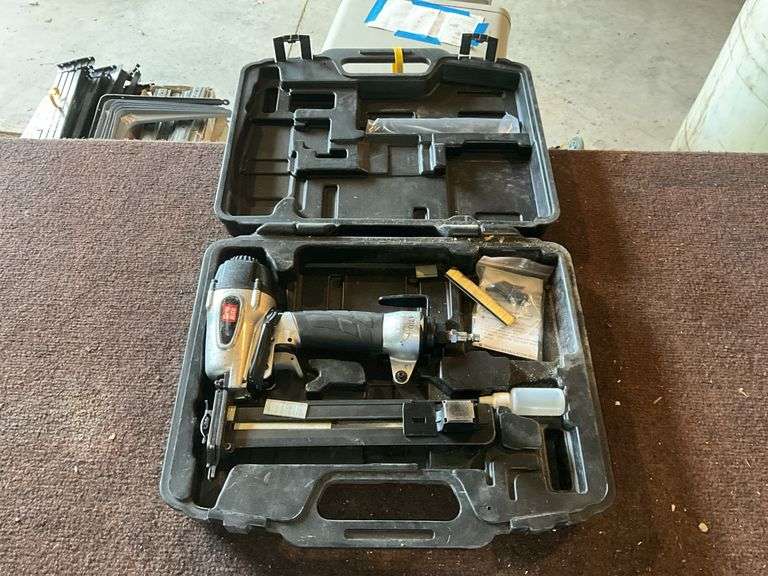 Pneumatic stapler with case - Hamilton-Maring Auction Group