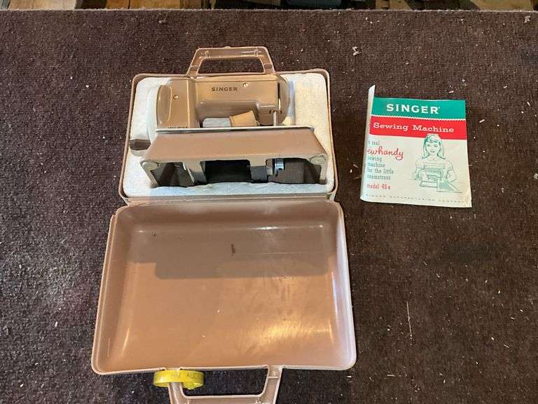 Singer portable sewing machine - Hamilton-Maring Auction Group