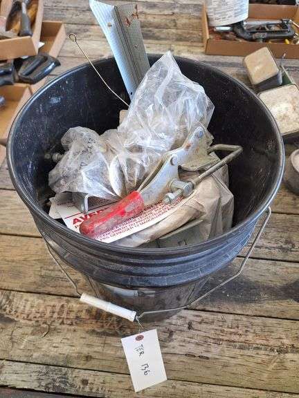 Bucket of garage door hardware - Hamilton-Maring Auction Group
