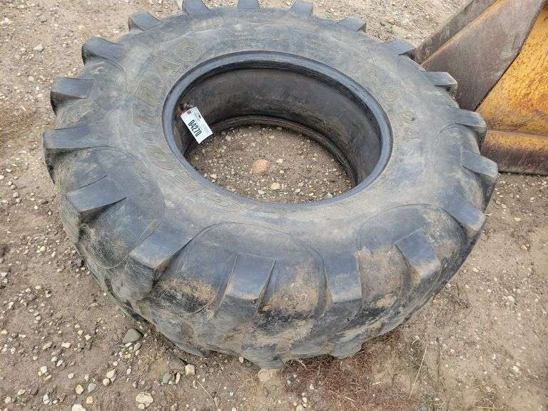 16.9 x24 Rear Backhoe Tire with Tube - Hamilton-Maring Auction Group