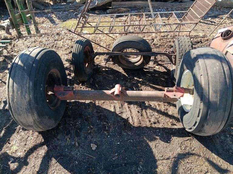 (2) Axles with Tires - Hamilton-Maring Auction Group