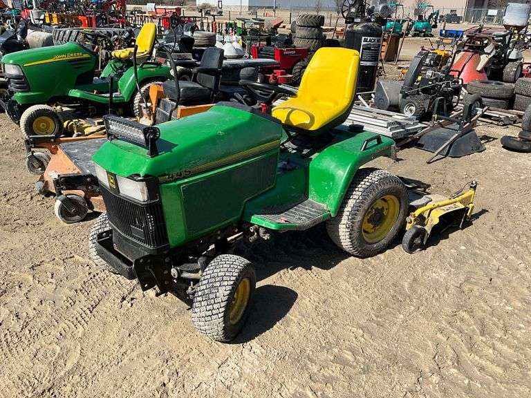 JD 445 mower, 60" deck; engine is bad - Hamilton-Maring Auction Group