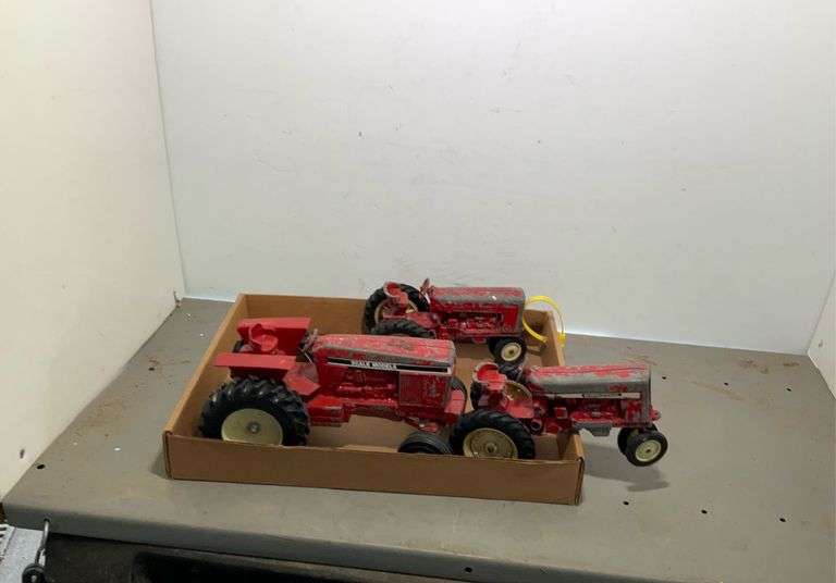 Flat with (3) International Tractors - Hamilton-Maring Auction Group