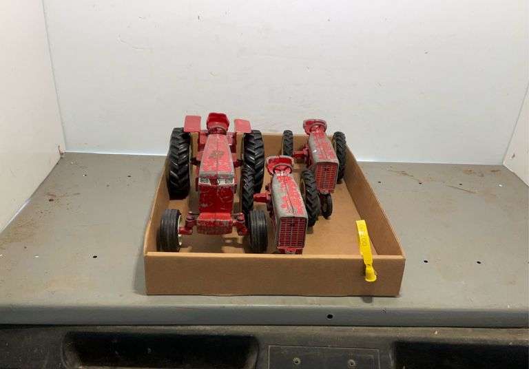 Flat with (3) International Tractors - Hamilton-Maring Auction Group