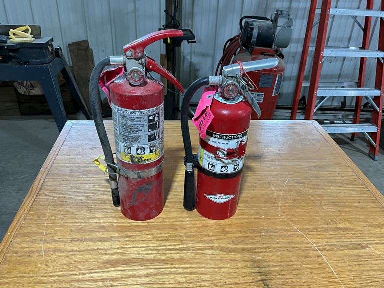 (2) fire extinguishers - Hamilton-Maring Auction Group