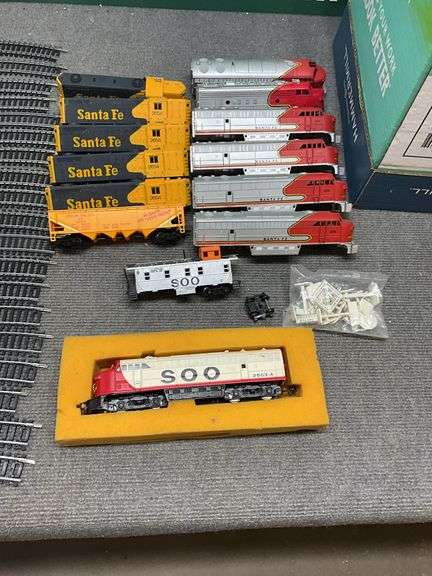 Box of train tracks, locomotive covers, & SOO Loco - Hamilton-Maring ...