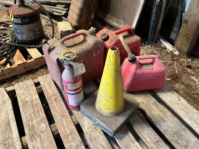 Gas cans, fire extinguisher, & yellow cones - Hamilton-Maring Auction Group