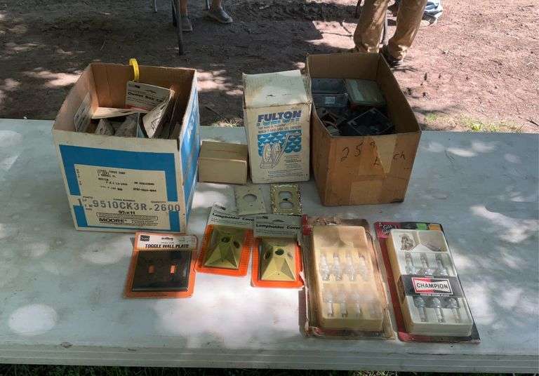 2 Boxes of spark plugs, outlet covers, outlet boxes, hand wench ** semi ...