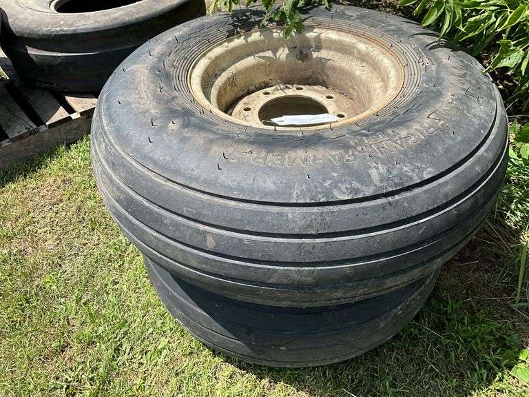 (2) 12.5L-15 Tires on 8 Bolt Implement Rims - Hamilton-Maring Auction Group