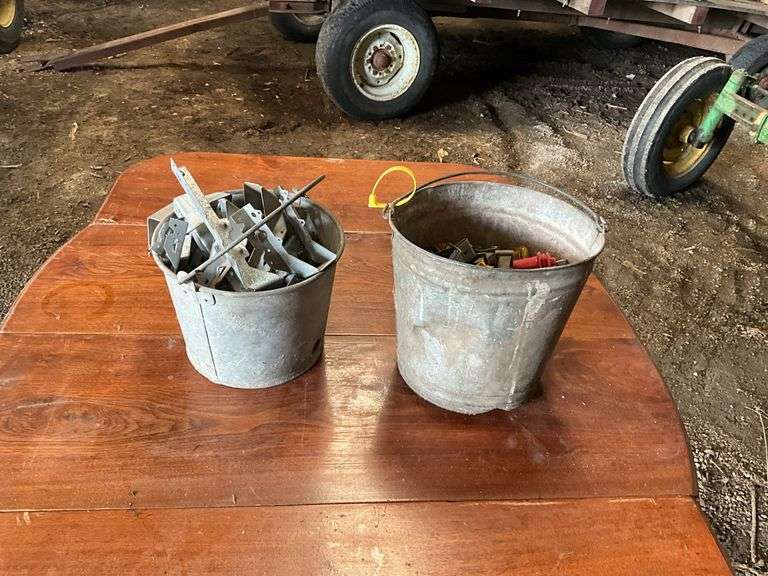 Buckets of electric fence insulators & joist hangers - Hamilton-Maring ...