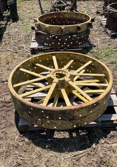 (2) JD metal flat rims w/bolt on centers - Hamilton-Maring Auction Group