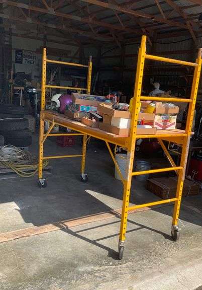 yellow rolling scaffolding - Hamilton-Maring Auction Group