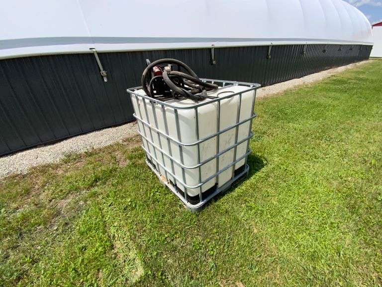 275 gal poly tote with pump - Hamilton-Maring Auction Group